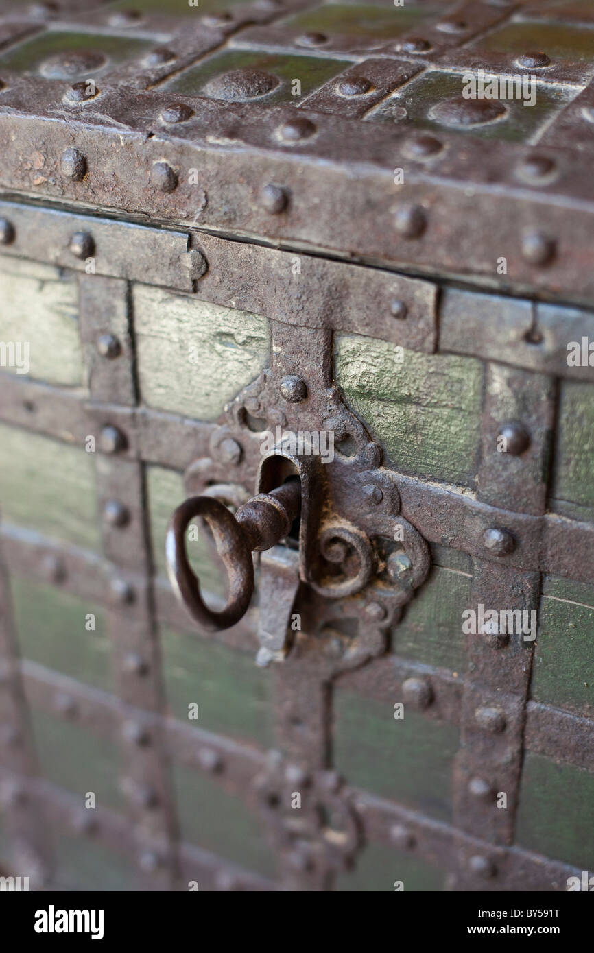 Detail of a lock and key on a trunk Stock Photo - Alamy