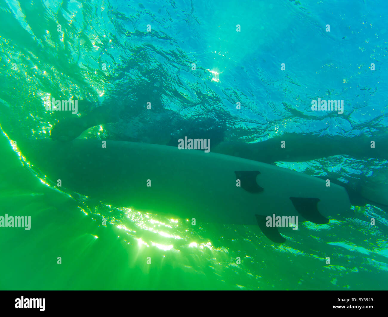 Surfer from below hi-res stock photography and images - Alamy