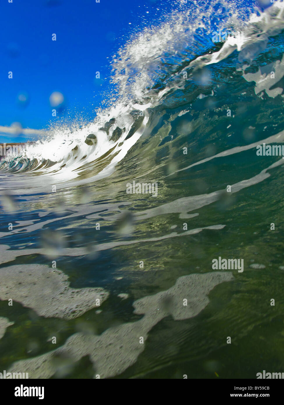 Breaking wave viewed from inside the water Stock Photo - Alamy