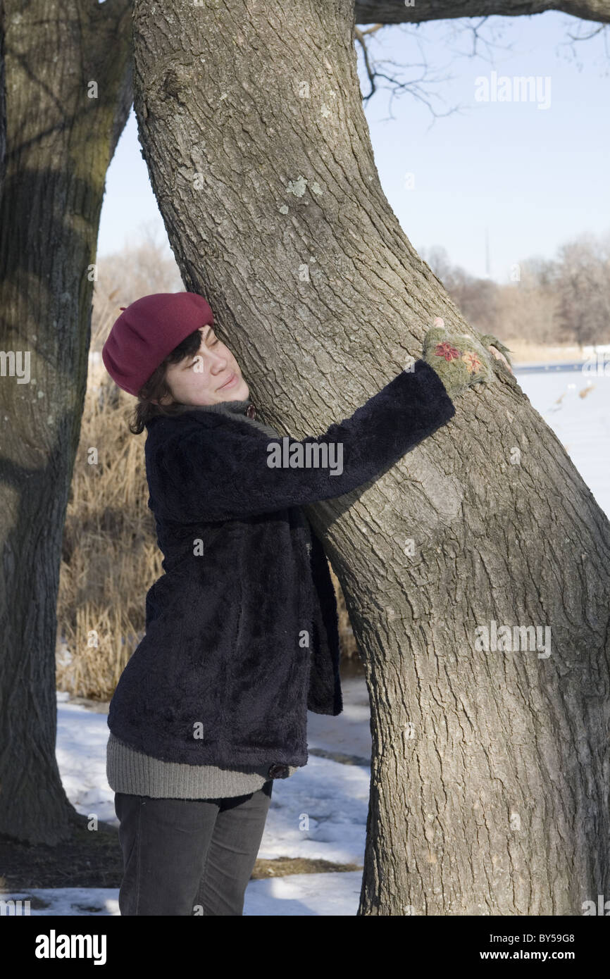 Young woman hugging hi-res stock photography and images - Alamy