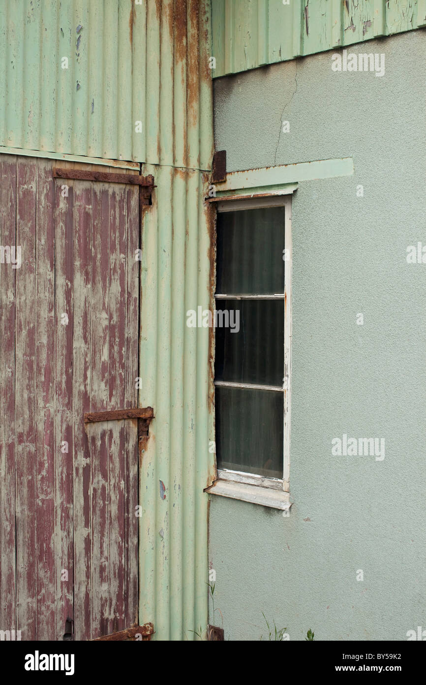 A run down facade of a building Stock Photo - Alamy