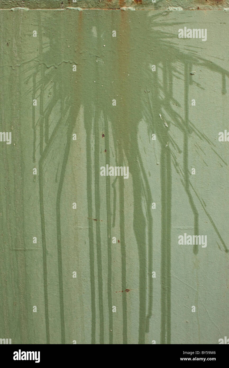 A liquid stain on a green wall Stock Photo - Alamy