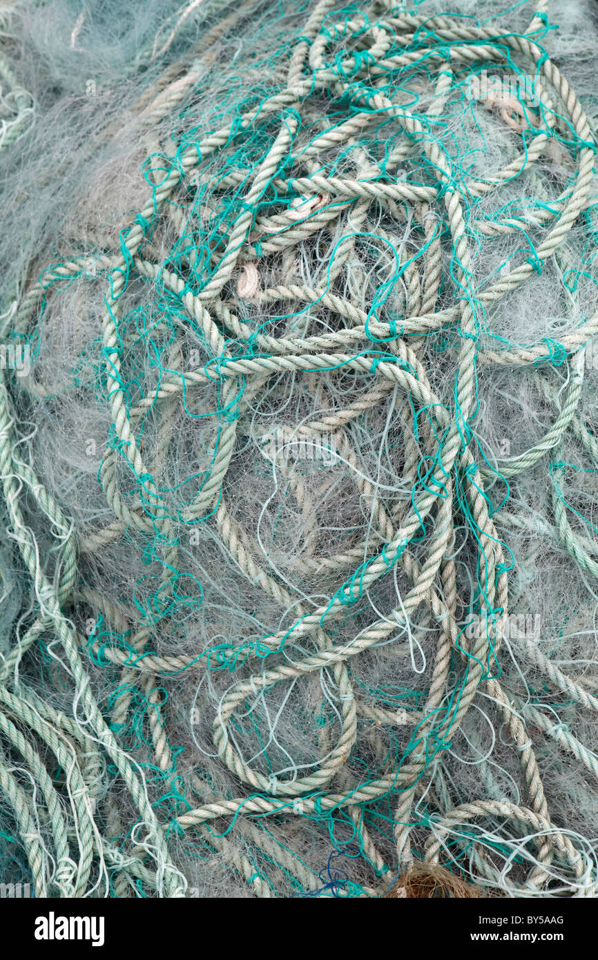 Detail of ropes and fishing nets on the ground Stock Photo - Alamy