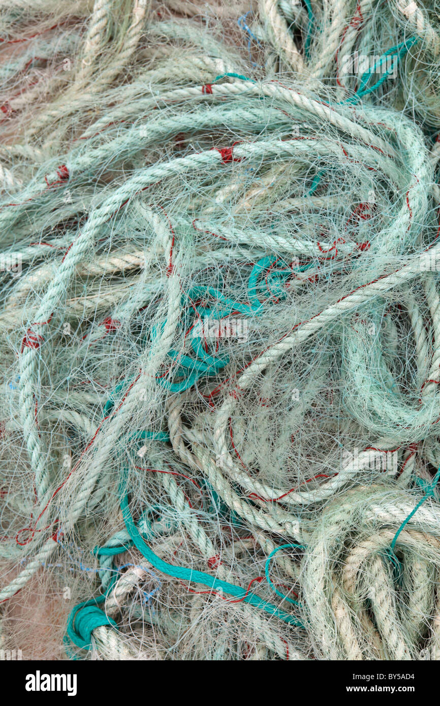 Detail of ropes and fishing nets on the ground Stock Photo - Alamy