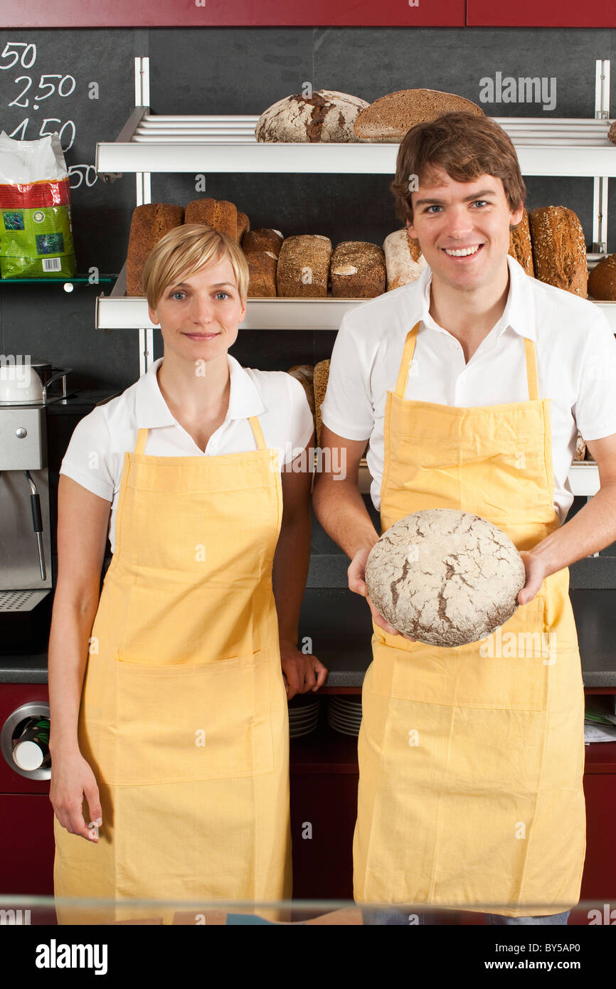 Two sales clerks in a bakery cafe Stock Photo - Alamy