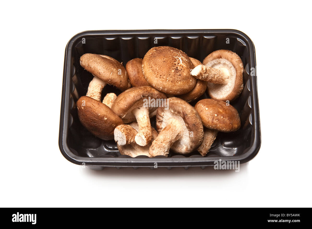 Container or packet Shitake mushrooms Stock Photo - Alamy