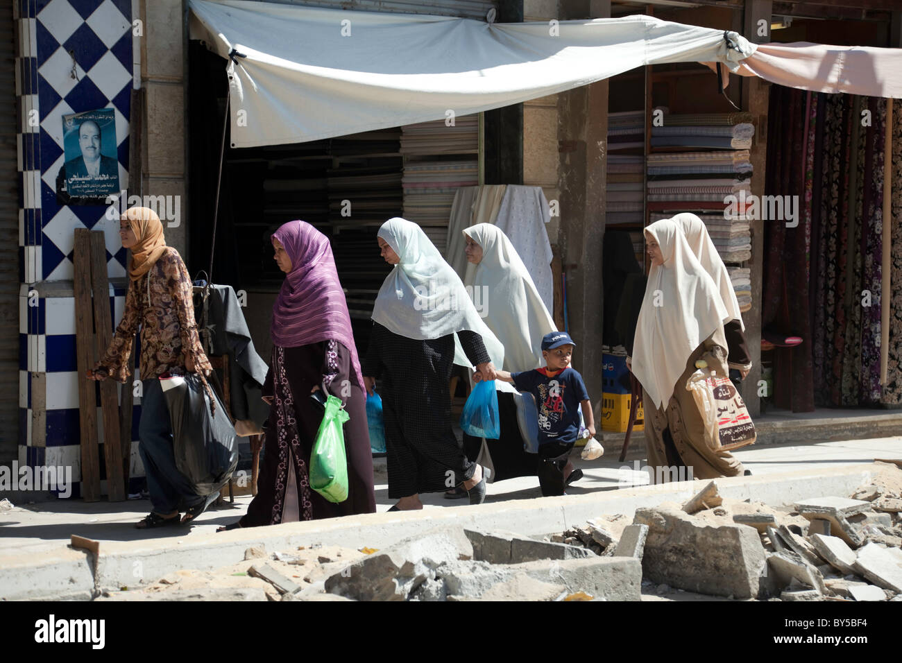The scene of Islamic women walk on the pavement of Alexandria, Egypt ...