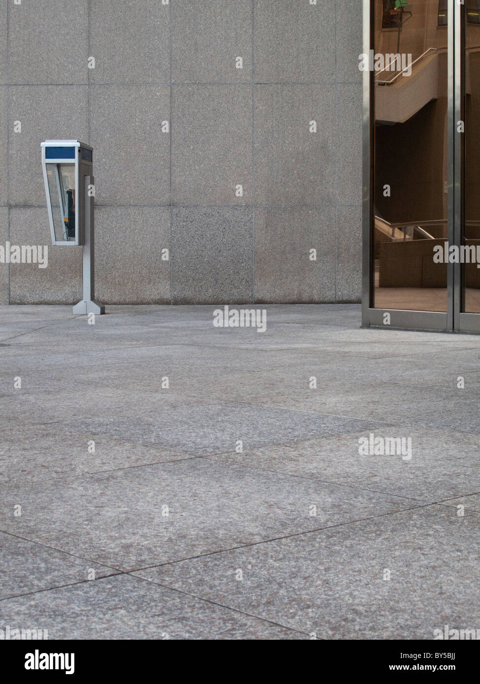 A payphone outside of an office building Stock Photo - Alamy