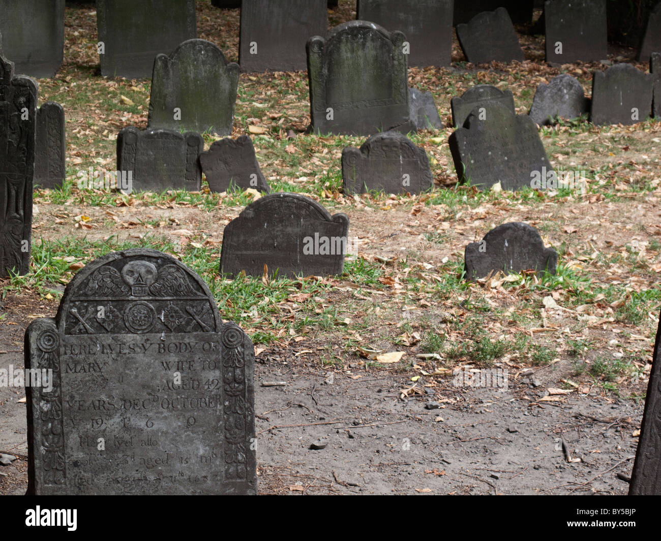 Old gravestones in front hi-res stock photography and images - Alamy