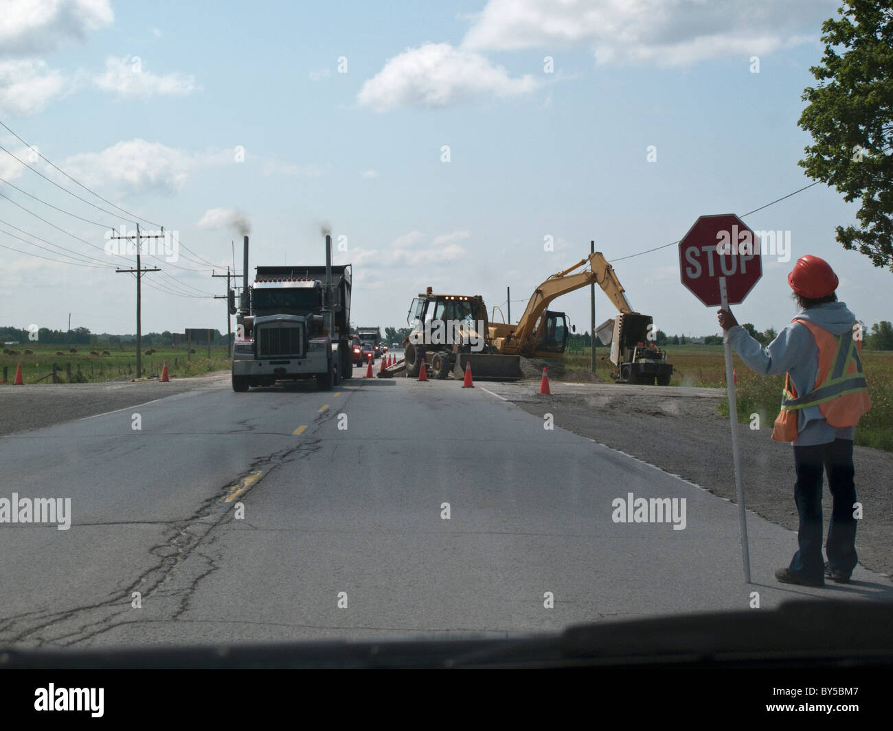 Construction holding stop sign hi-res stock photography and images - Alamy