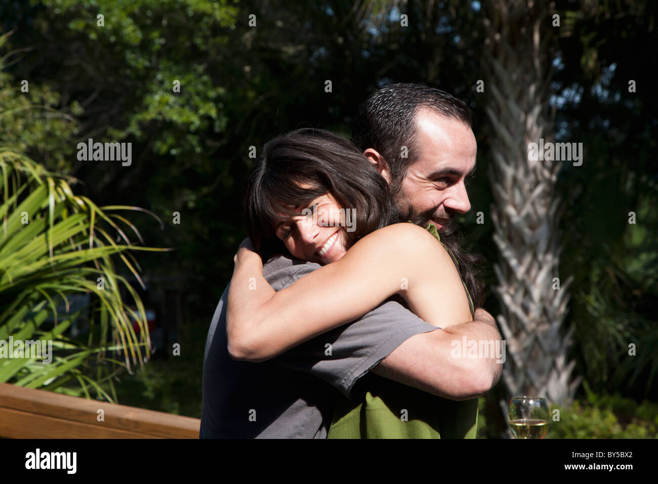 Couple tightly hugging hi-res stock photography and images - Alamy