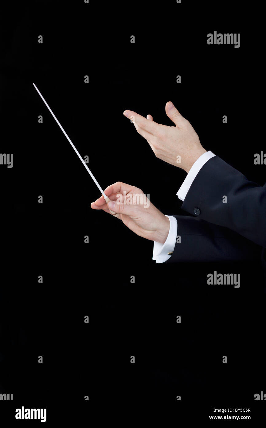 A conductor conducting, focus on hands Stock Photo - Alamy