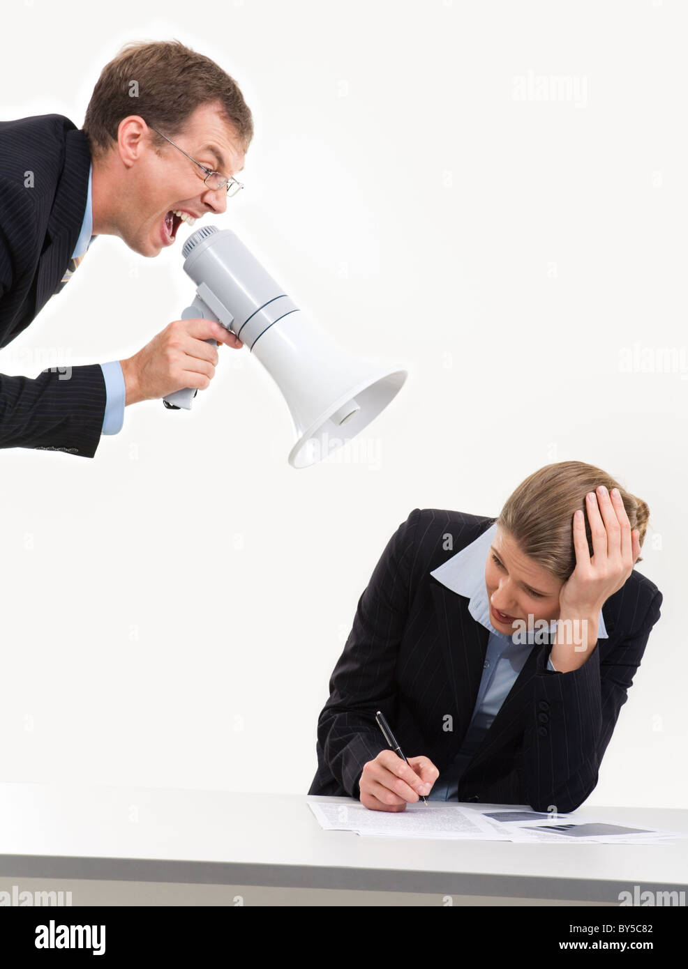 Photo of scared businesswoman closing her ears by hands while boss ...