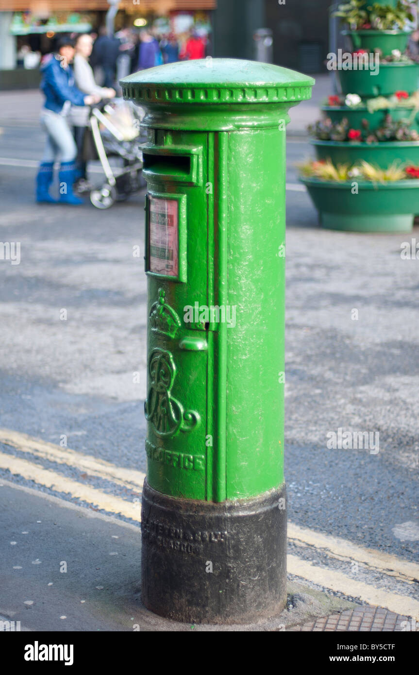 A green Irish postbox in Limerick, Republic of Ireland Stock Photo - Alamy