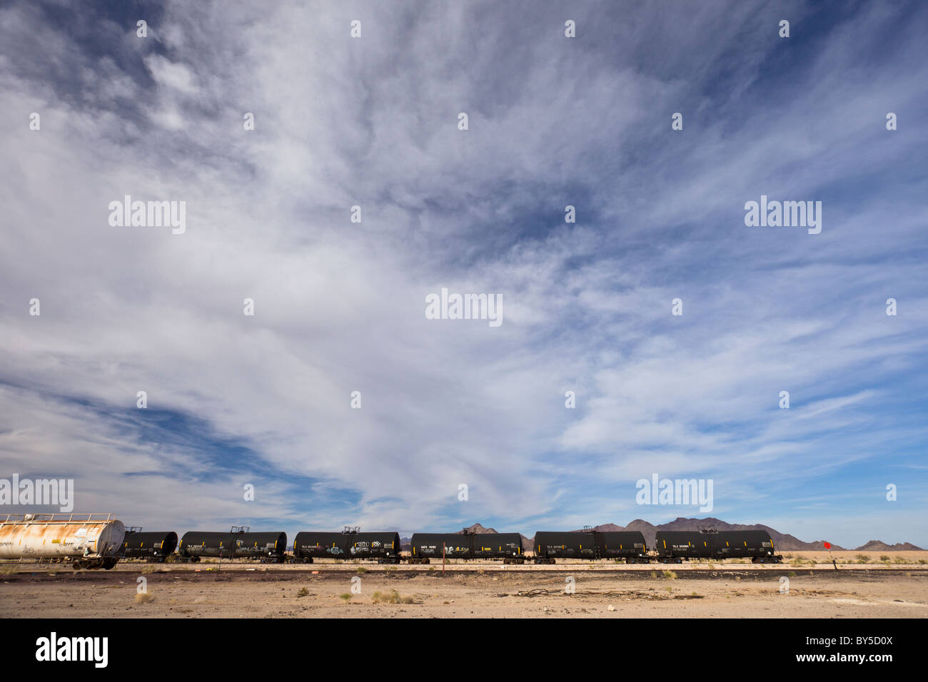 Sweeping clouds over train and tracks along Highway 62 in Rice ...