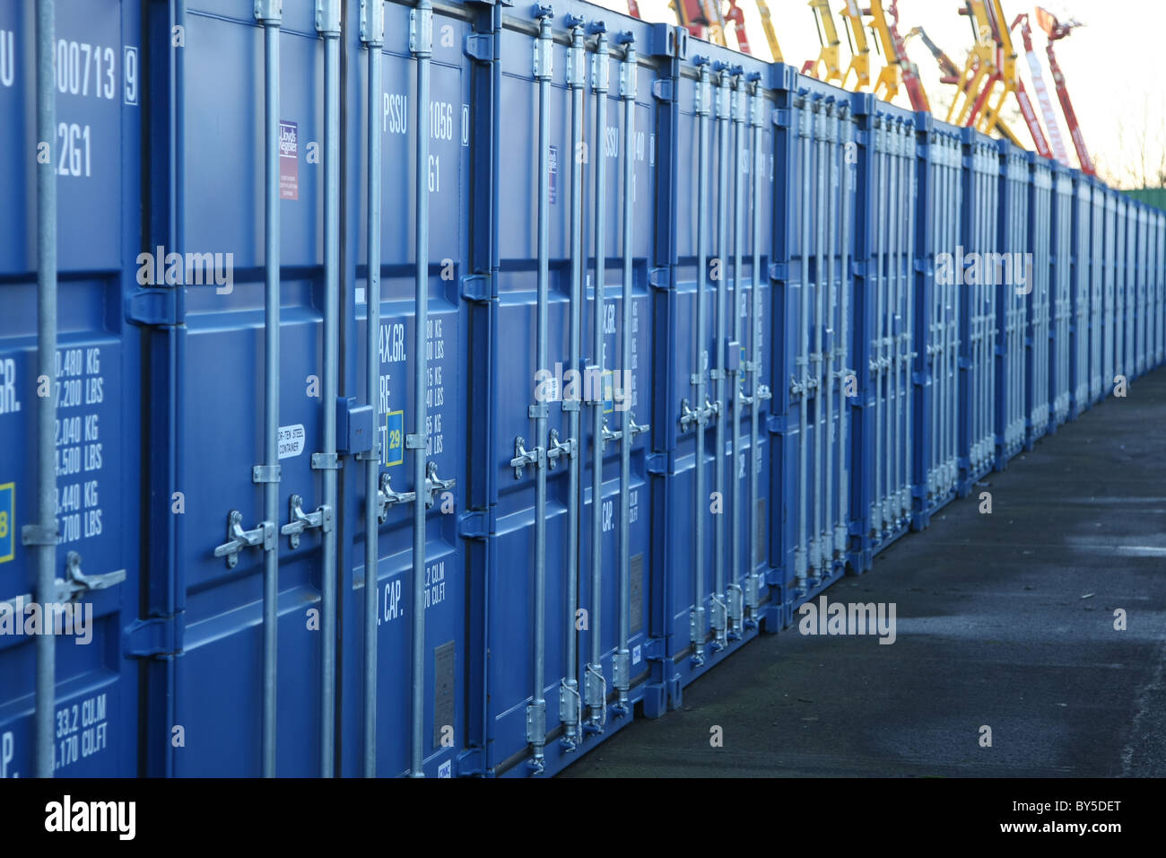 Row of shipping containers Stock Photo - Alamy