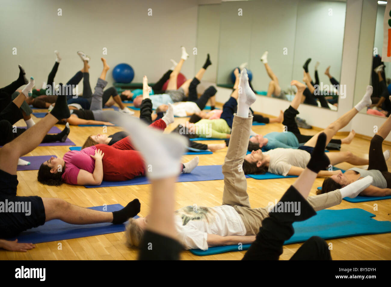 Exercisers participate in a pilates class at the Chelsea Recreation ...