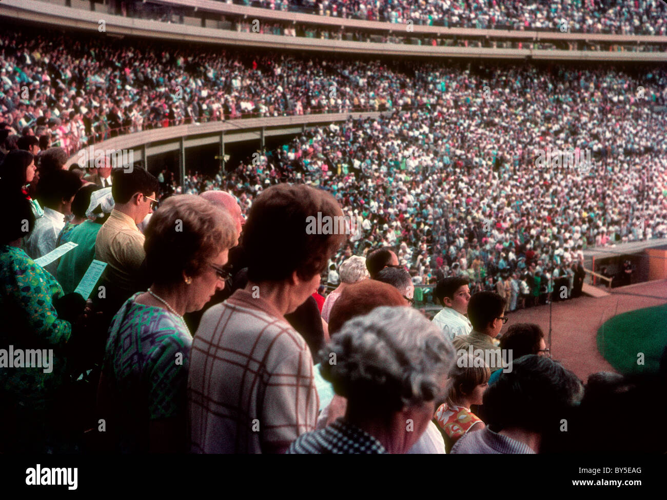 Participants fill the seats at Shea Stadium in the New York borough of ...