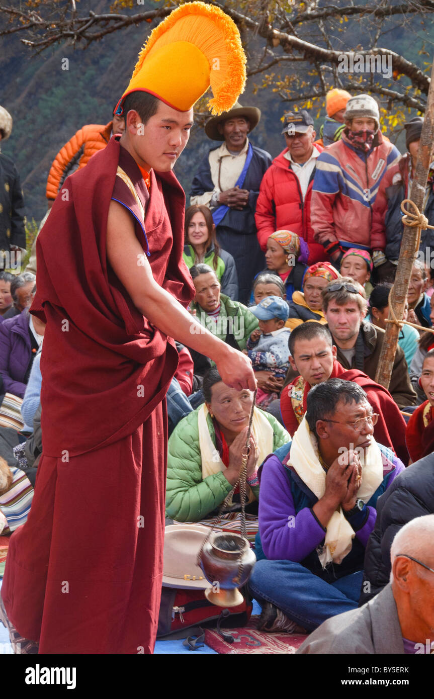 yellow hat Gelugpa monk at the Mani Rimdu Festival at Tengboche ...