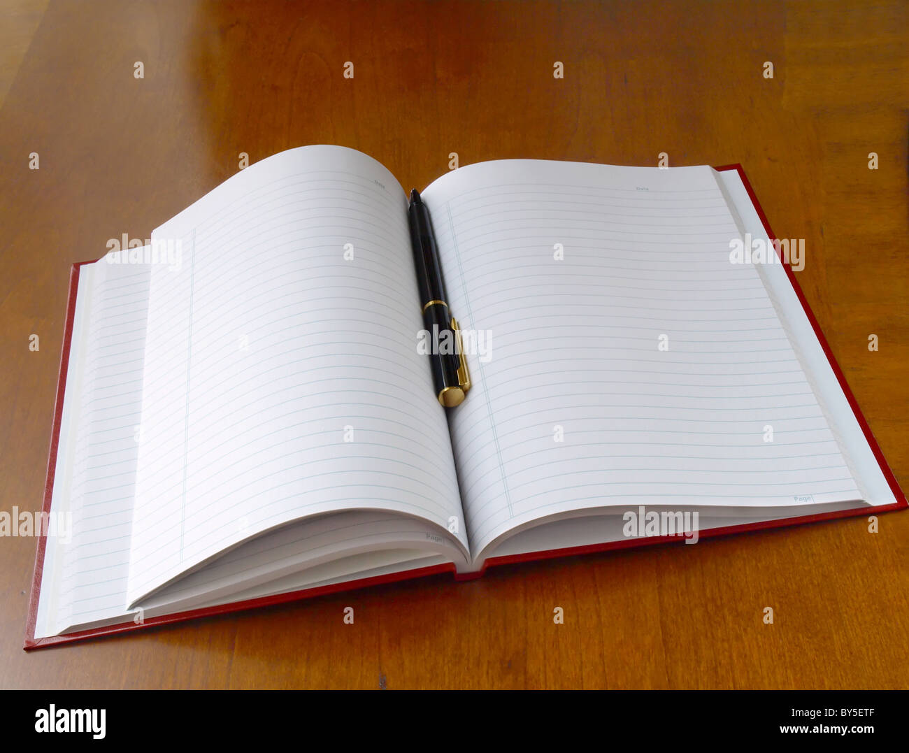 Planner with pen on the table Stock Photo - Alamy