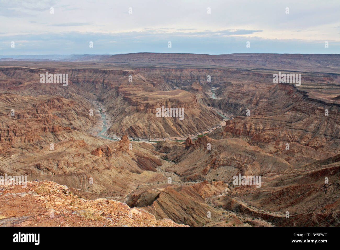 A beautiful vista of rain over the Fish River Canyon, Namibia, Southern ...