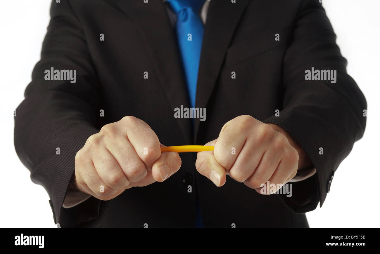 close up detail of mans hands breaking a pencil Stock Photo - Alamy