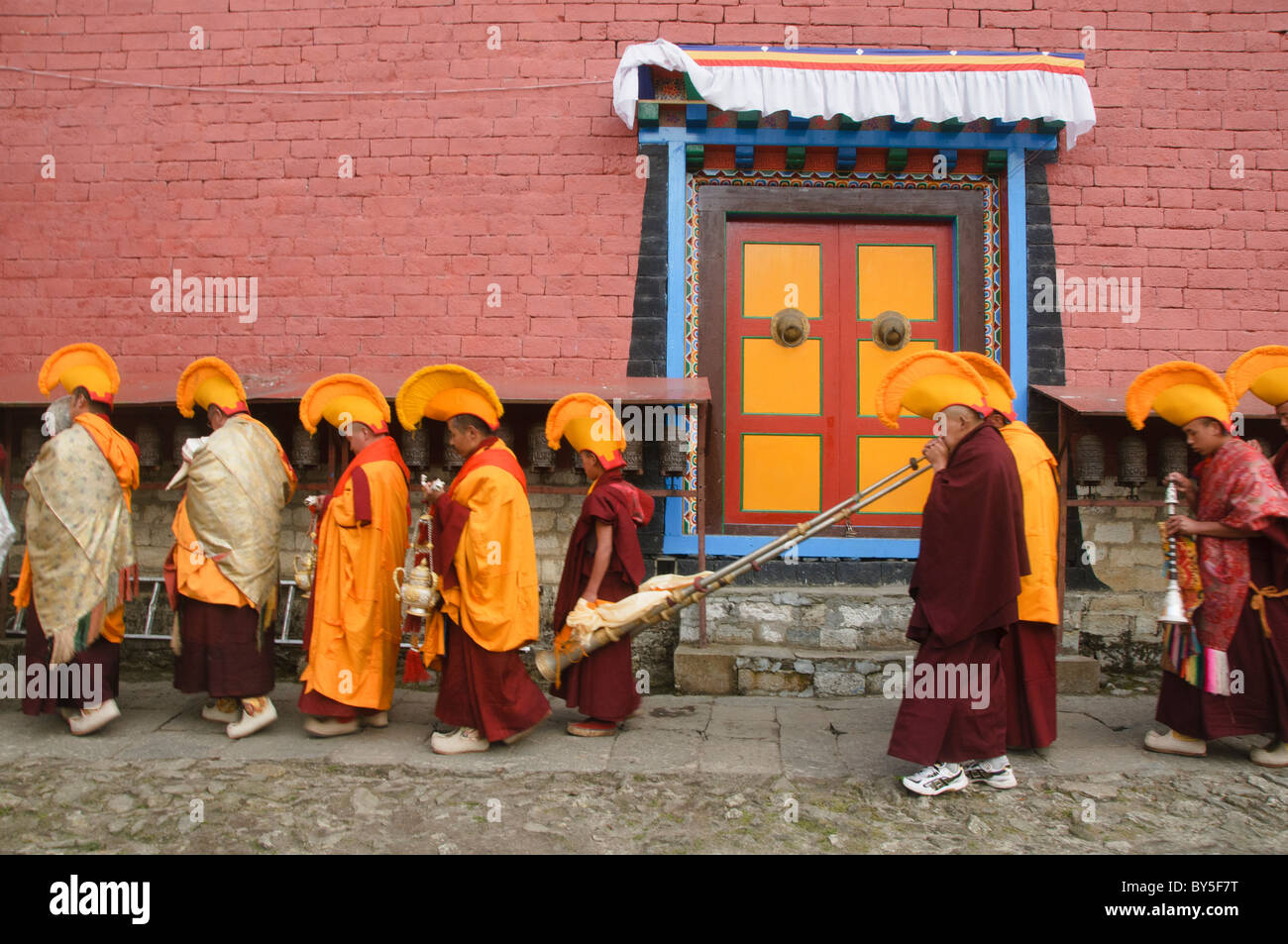 yellow hat Gelugpa monks at the Mani Rimdu Festival at Tengboche ...