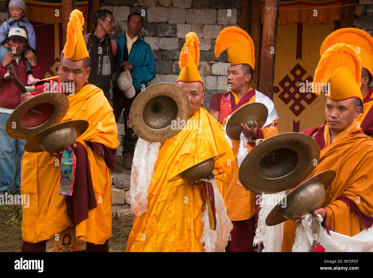 yellow hat Gelugpa monks at the Mani Rimdu Festival at Tengboche ...