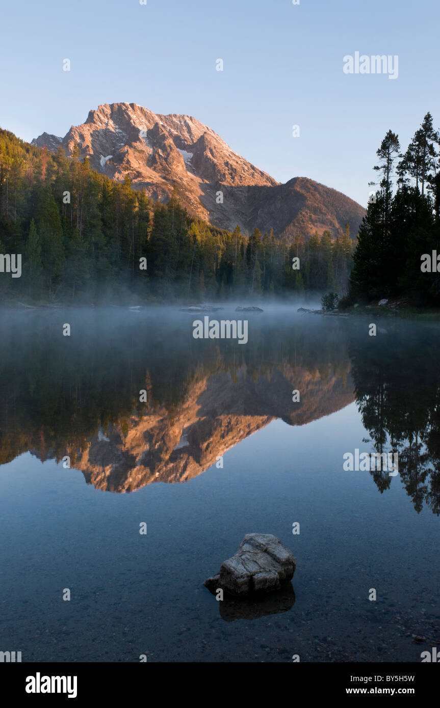 Mt Moran reflects on String Lake at sunrise Stock Photo - Alamy