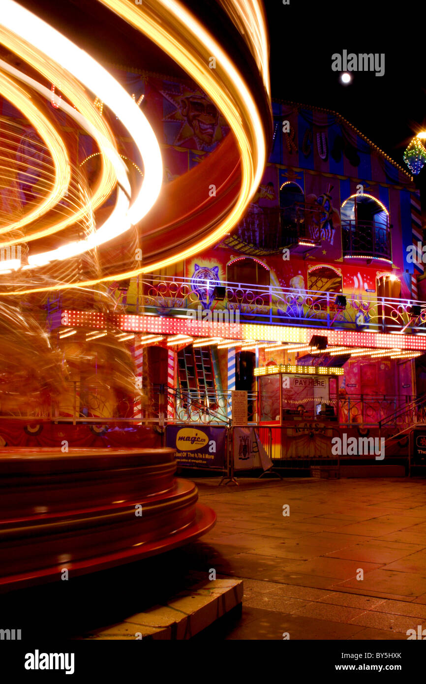 Carousel ride at night, German market, Leeds, Yorkshire, England Stock ...