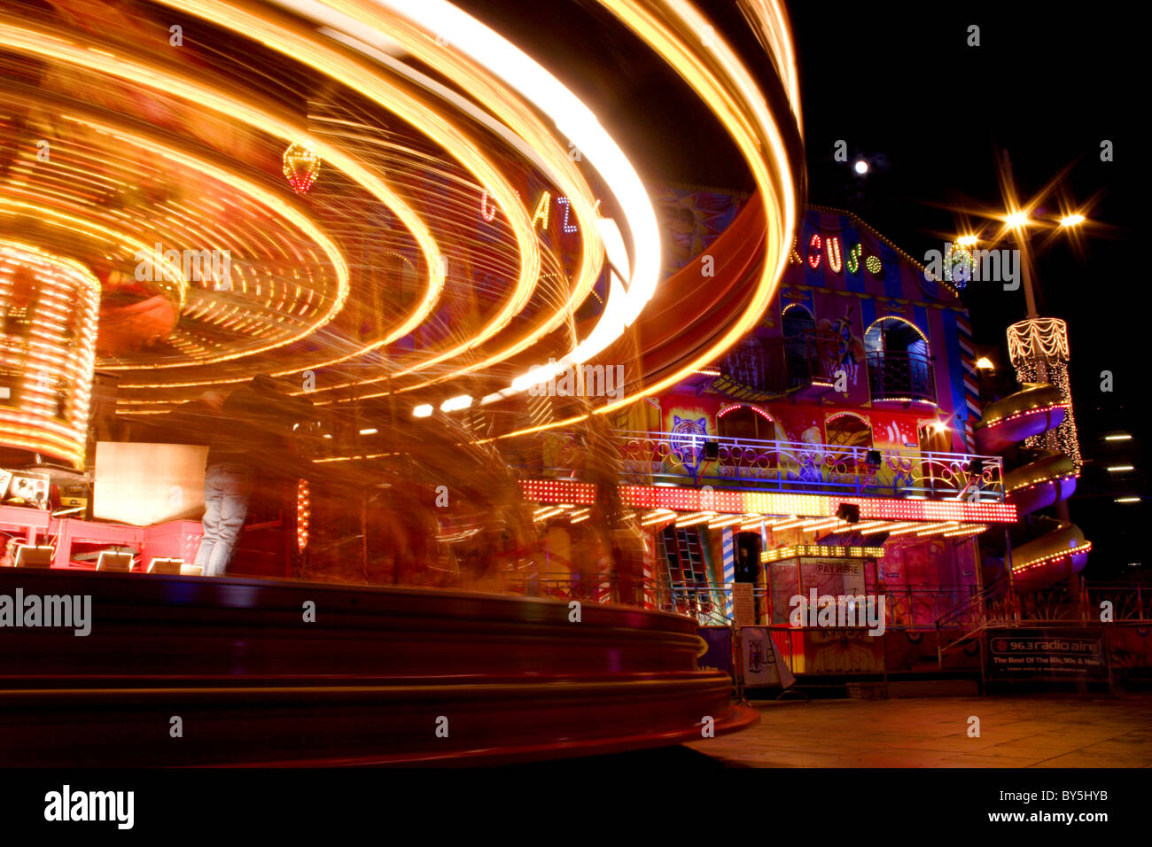 Carousel ride at night, German market, Leeds, Yorkshire, England Stock ...