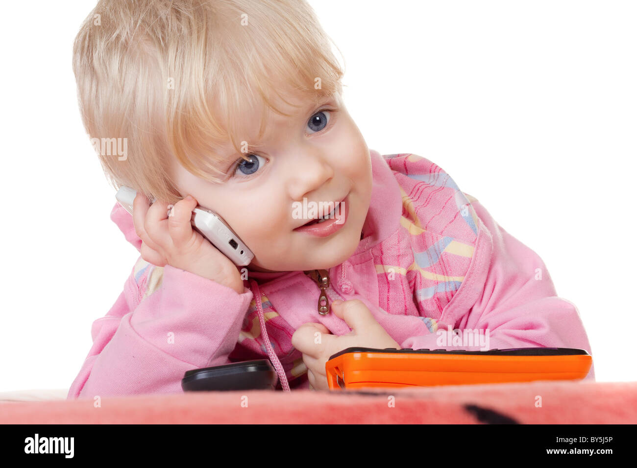 cute baby girl talking on mobile phone isolated on white Stock Photo ...
