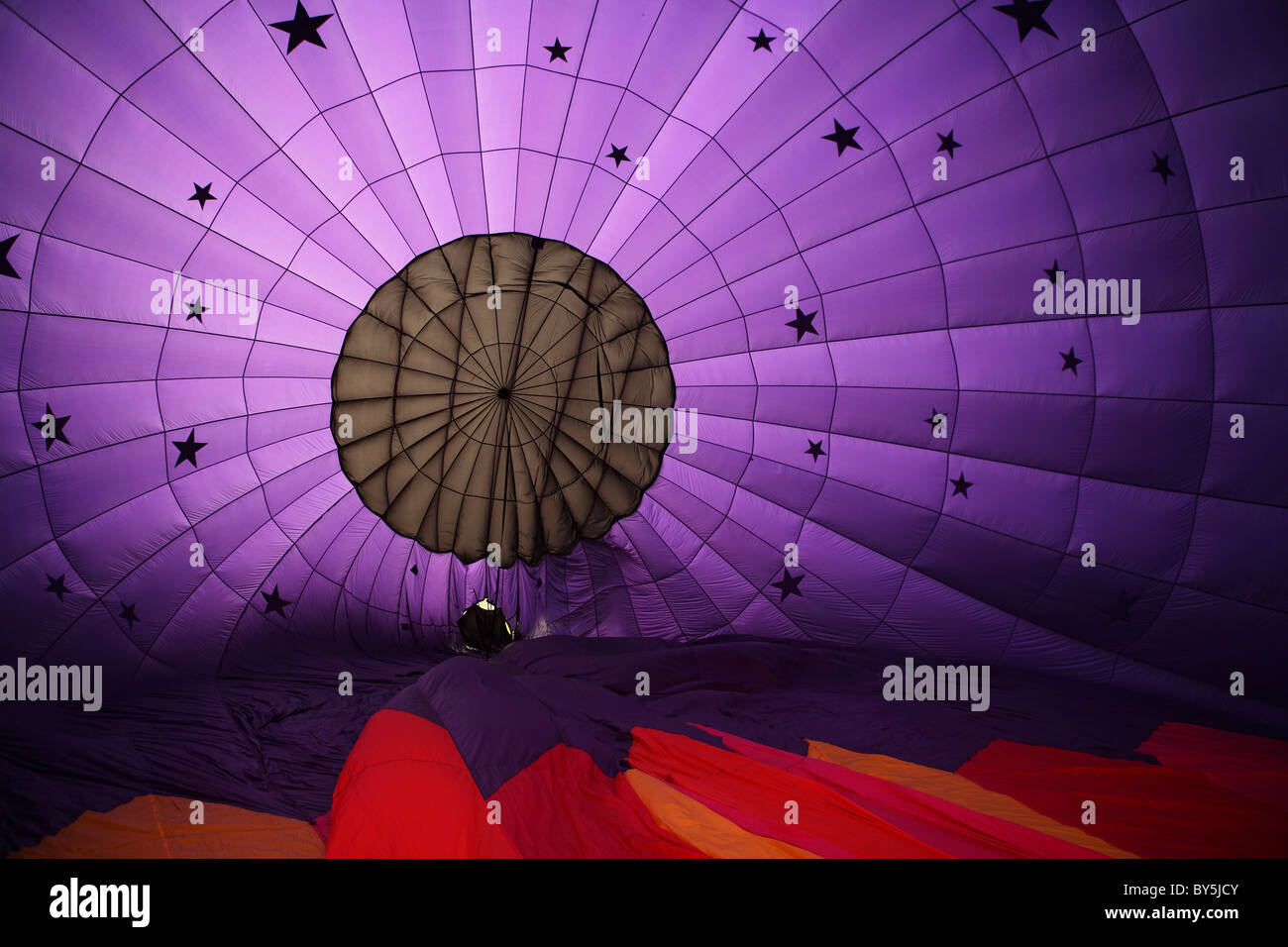 An interior view of a purple hot air balloon inflating Stock Photo - Alamy