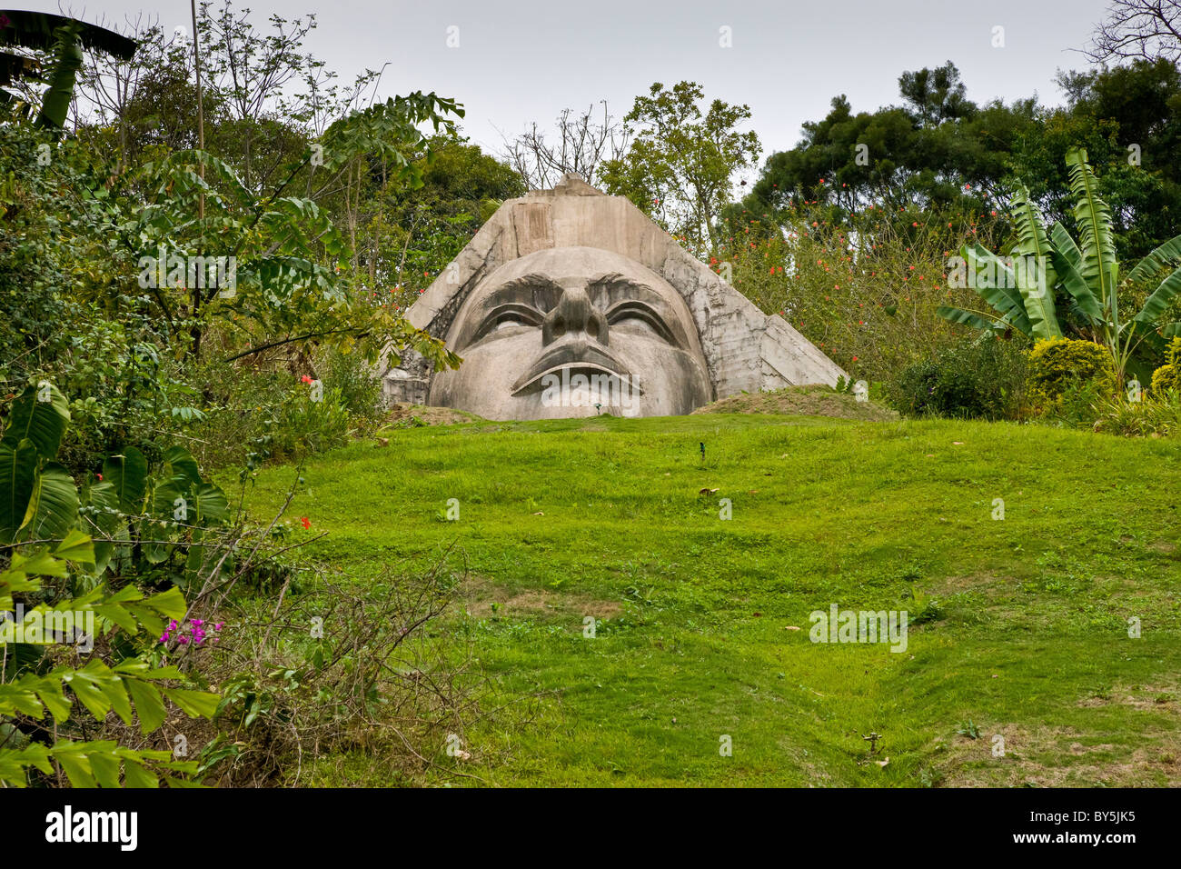 Giant carved head, Jinuo Luoke (Jinuo Shan), Jinghong, Xishuangbanna ...