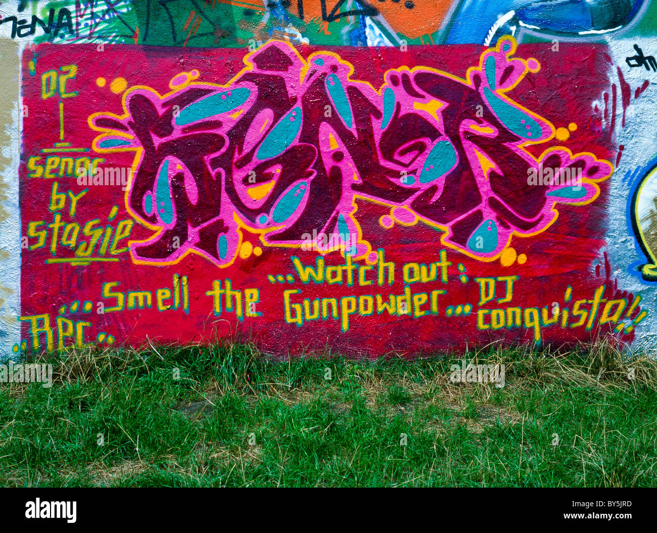 A wall covered in graffiti art Stock Photo - Alamy