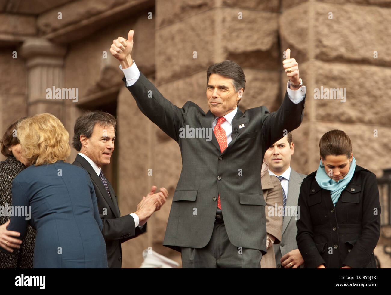 Texas Governor Rick Perry gives a thumbs up after being sworn in for ...