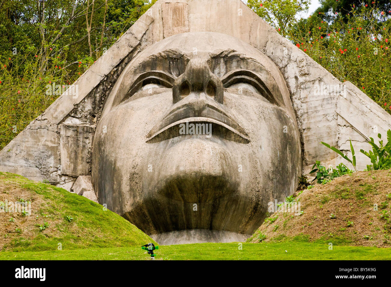 Giant carved head, Jinuo Luoke (Jinuo Shan), Jinghong, Xishuangbanna ...
