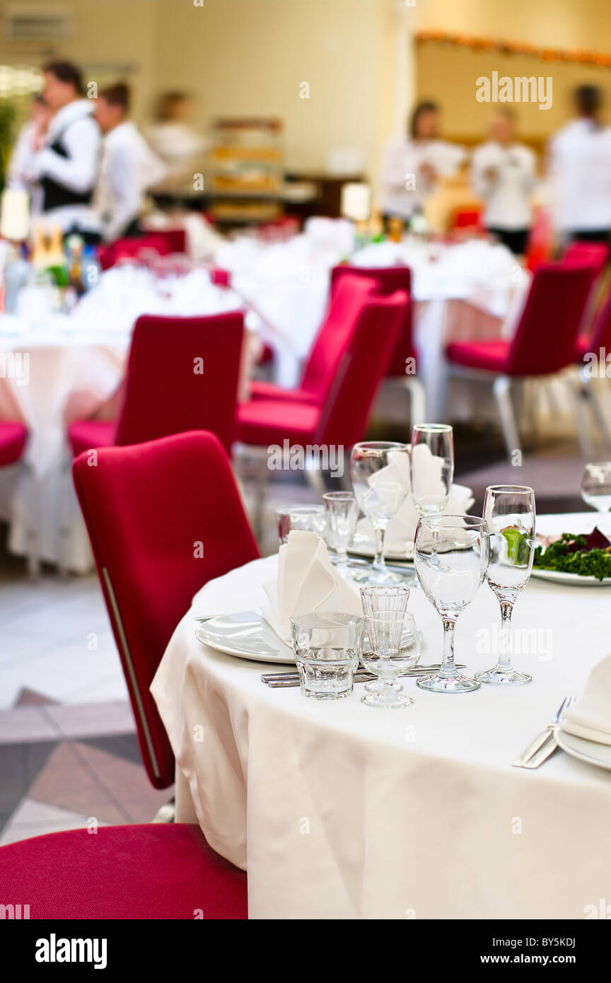 Events preparation for dinner, table appointment, unrecognizable ...