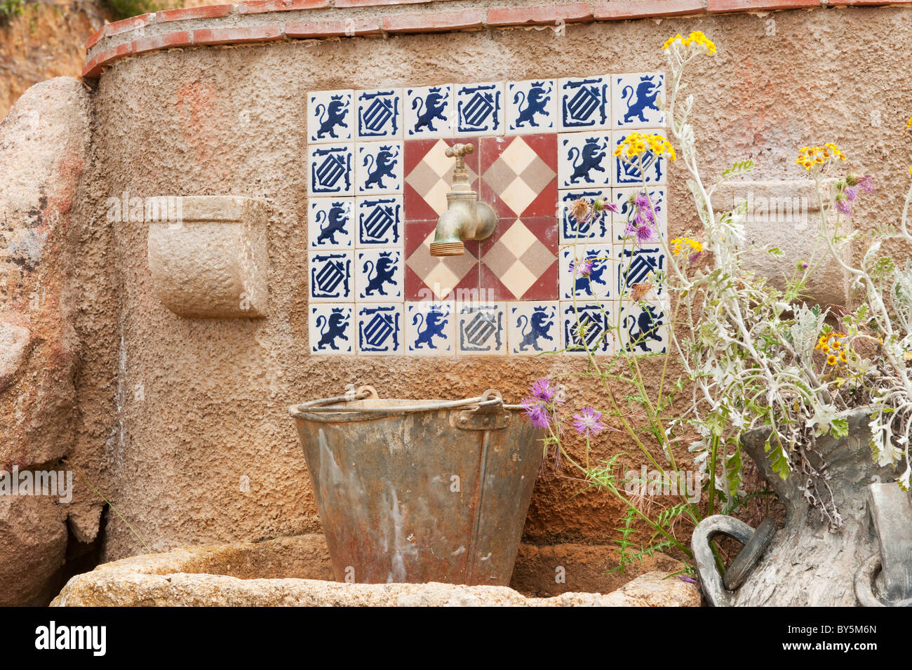 Old rustique romantic Spanish water tap outdoor Stock Photo - Alamy