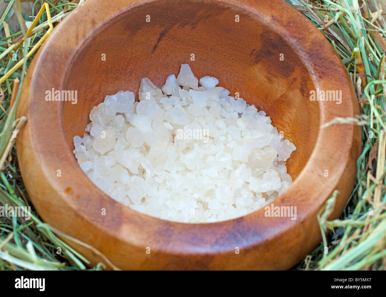 A wooden bucket full of white salt Stock Photo - Alamy
