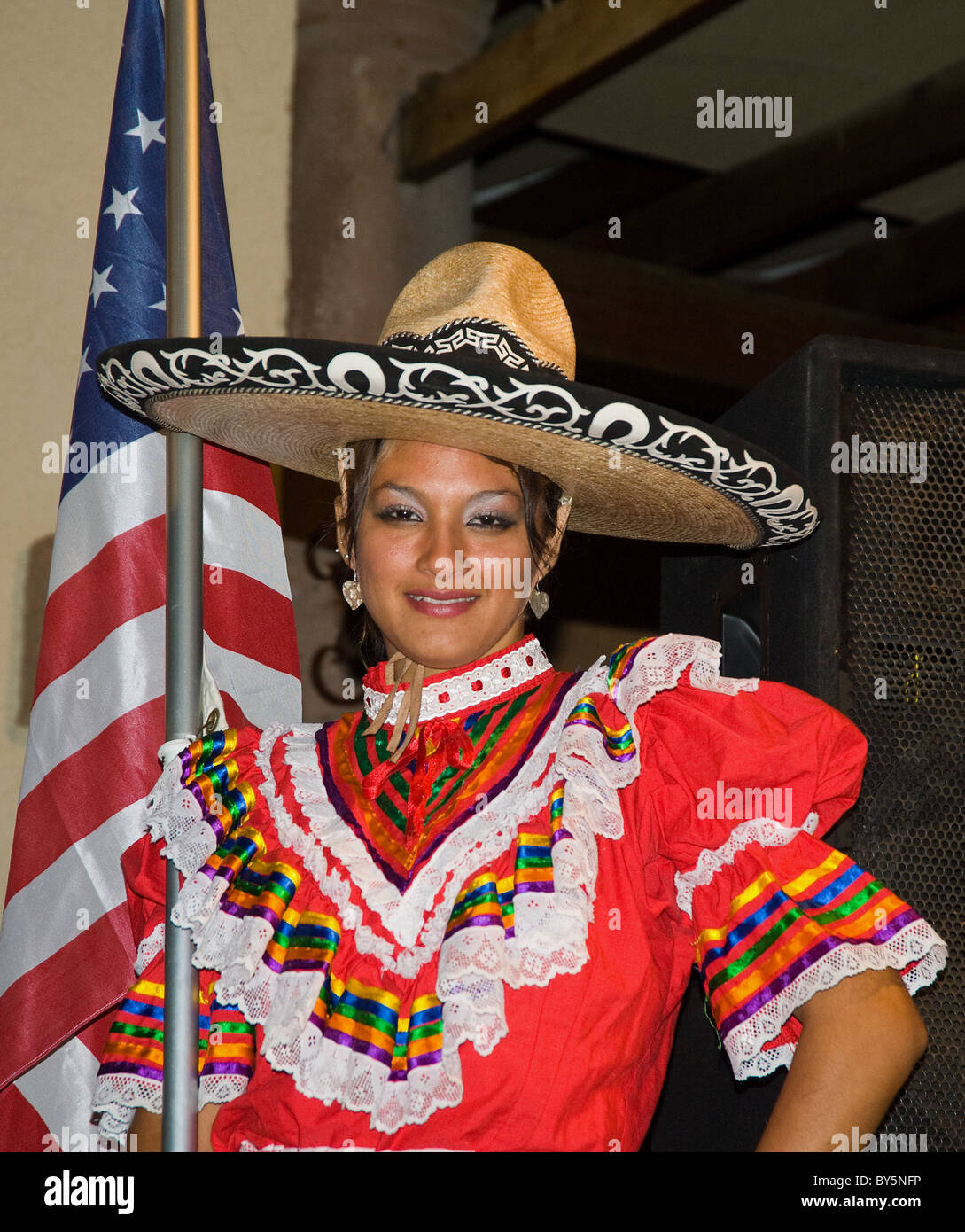 Mexican young lady dancer with American flag posing after concert Stock ...