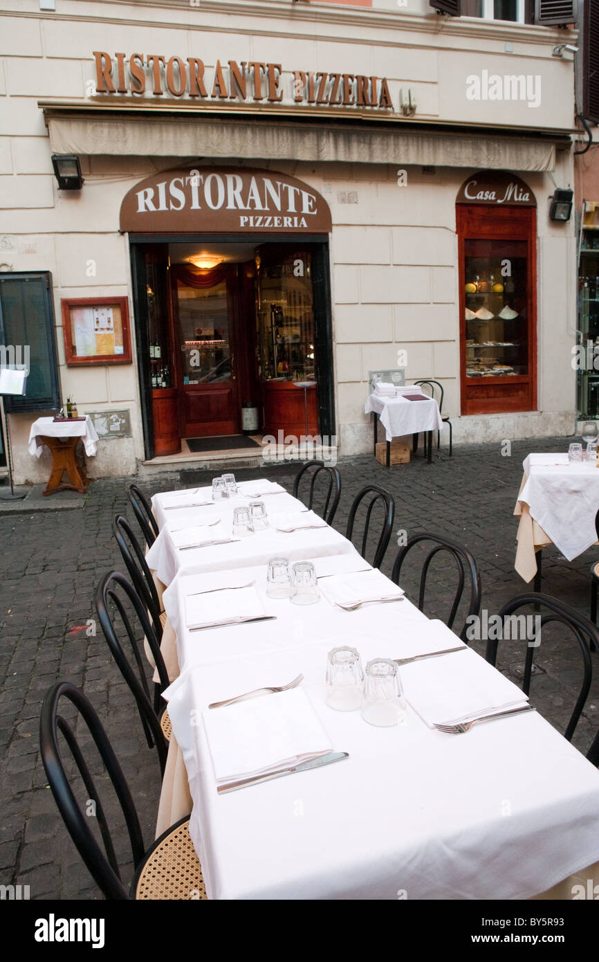 restaurant pizzeria Rome Italy outdoor door entrance and tables in the ...