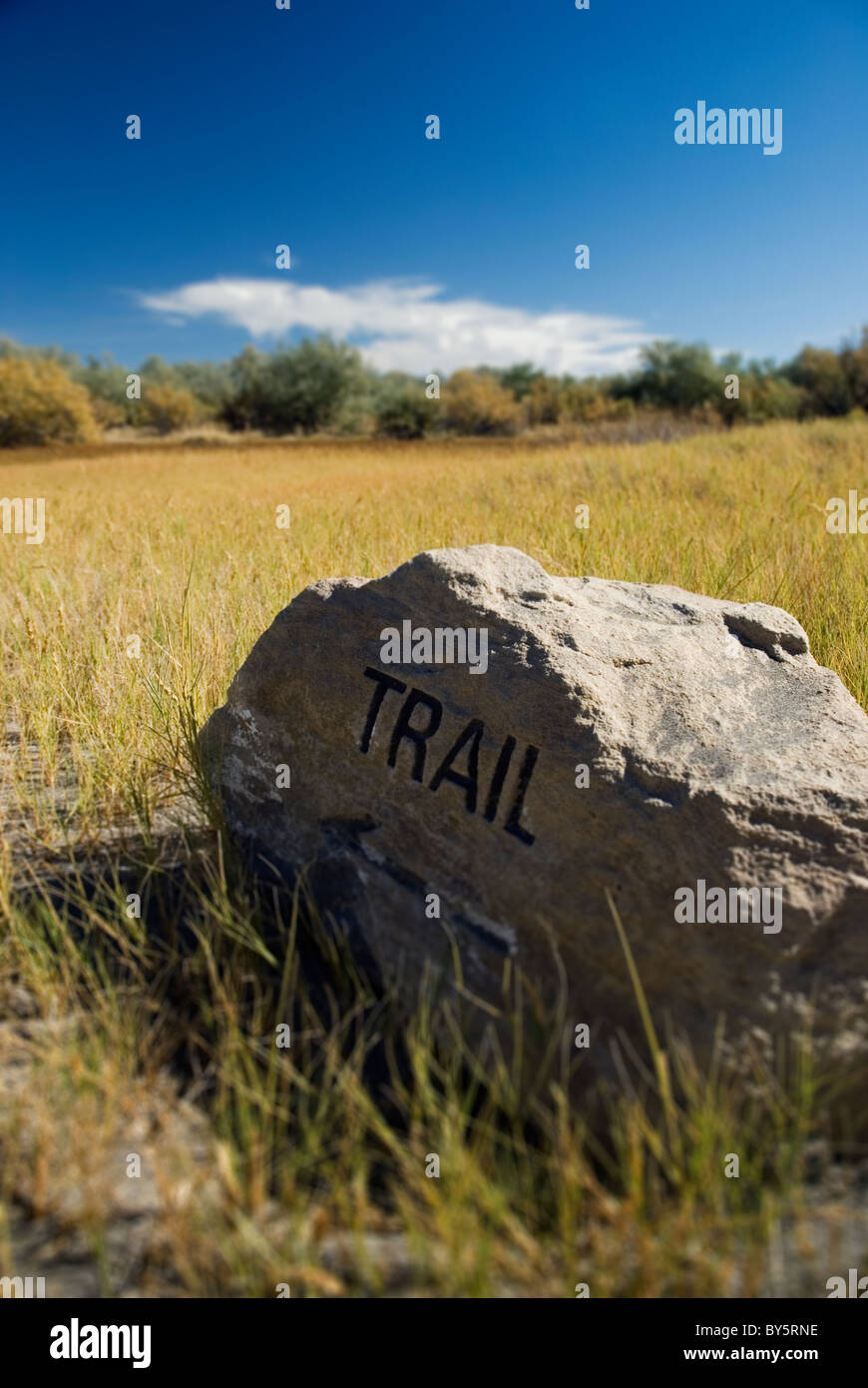 The rock marker at the start of a hiking trail head Stock Photo - Alamy