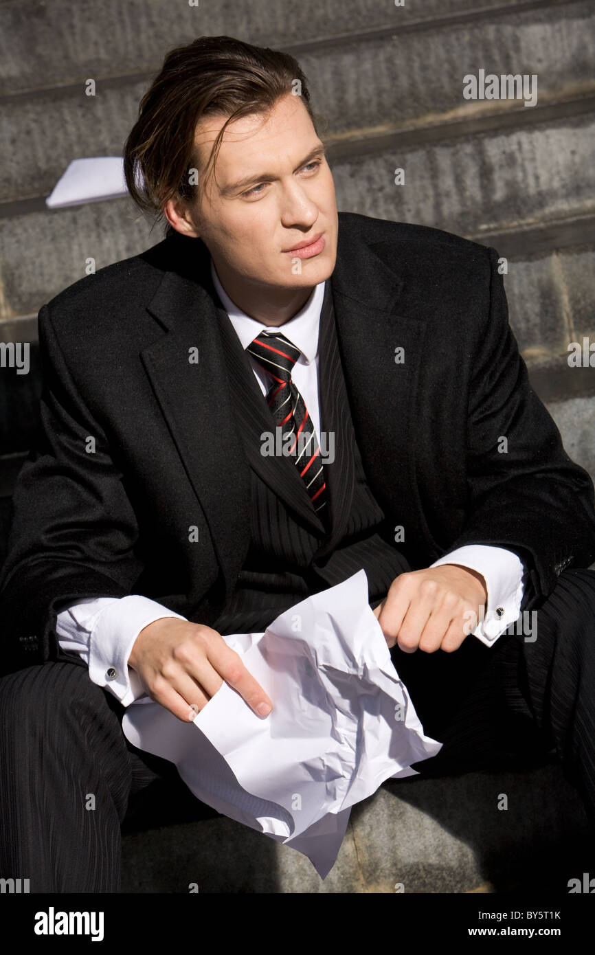 Portrait man holding piece paper hi-res stock photography and images ...