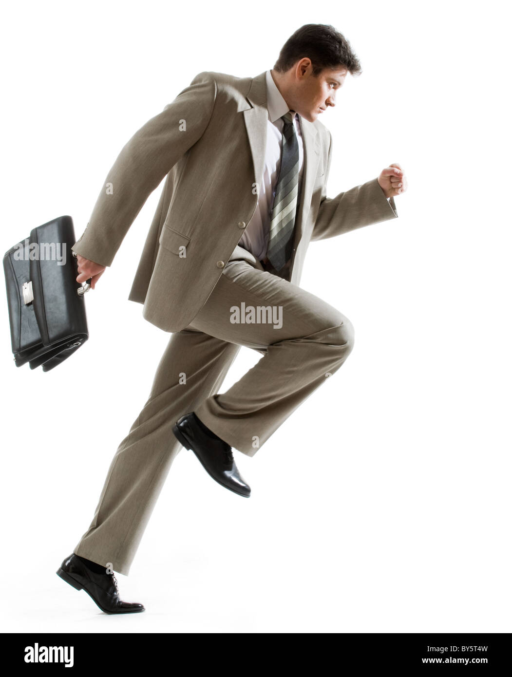 Image of serious businessman hurrying to his work Stock Photo - Alamy