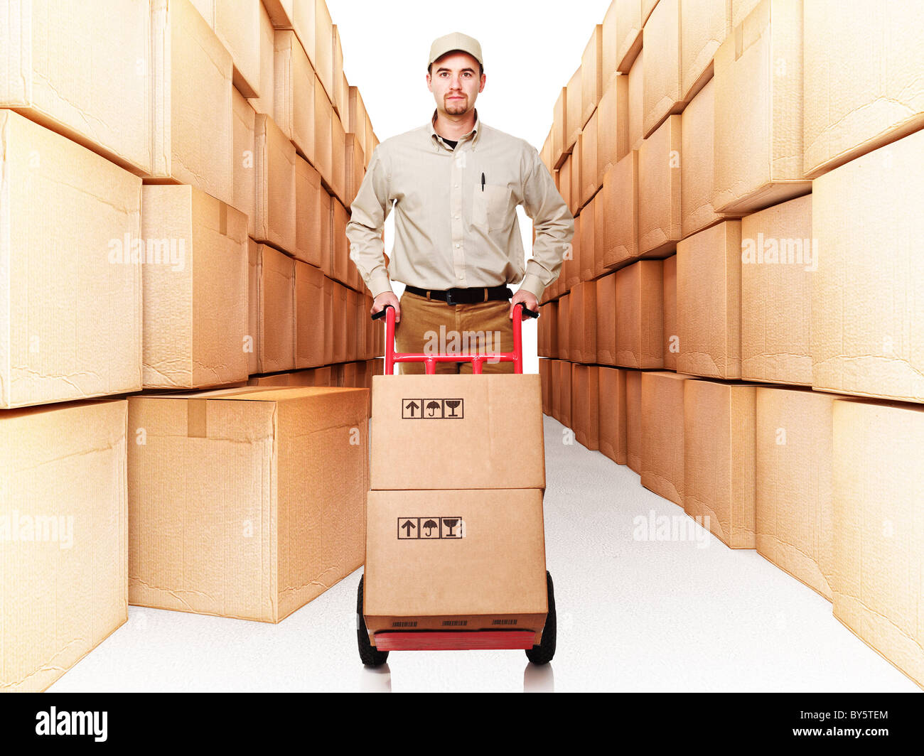 delivery man at work and 3d boxes background Stock Photo - Alamy