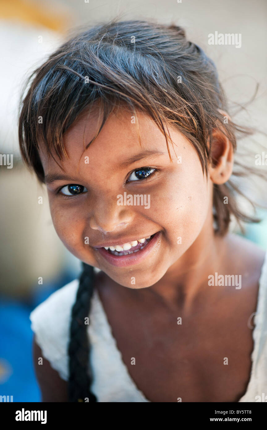 Young poor lower caste Indian street girl from Utter Pradesh smiling ...