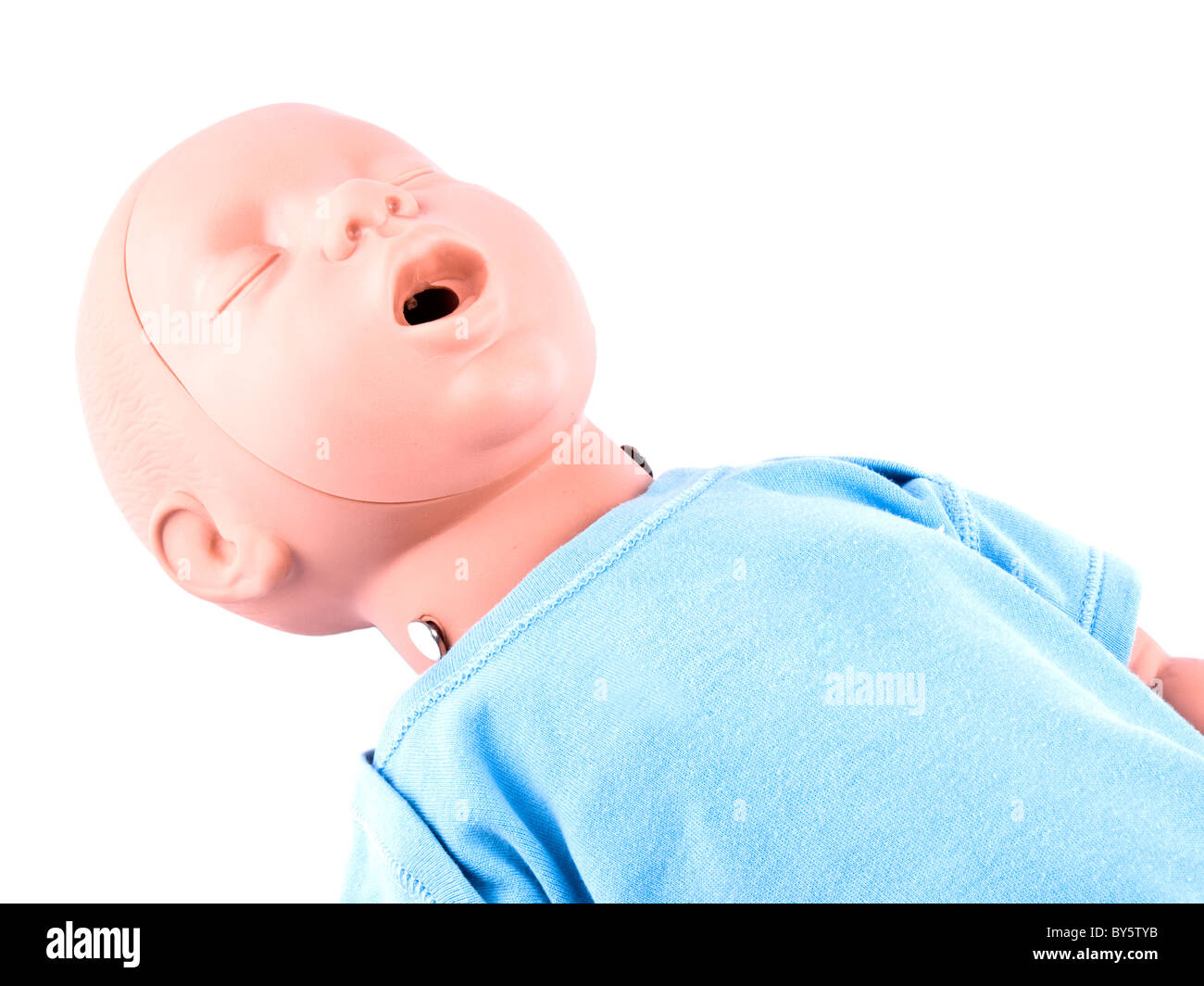 Closeup picture of first aid traning infant dummy on white background ...