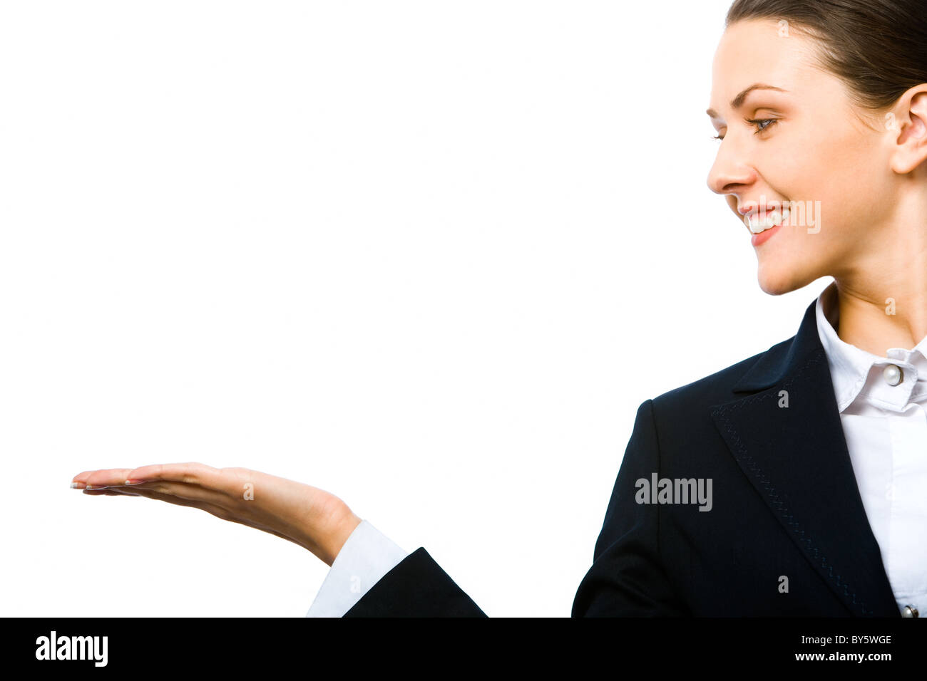 Portrait of young beautiful woman holding elegantly her hand on a white ...