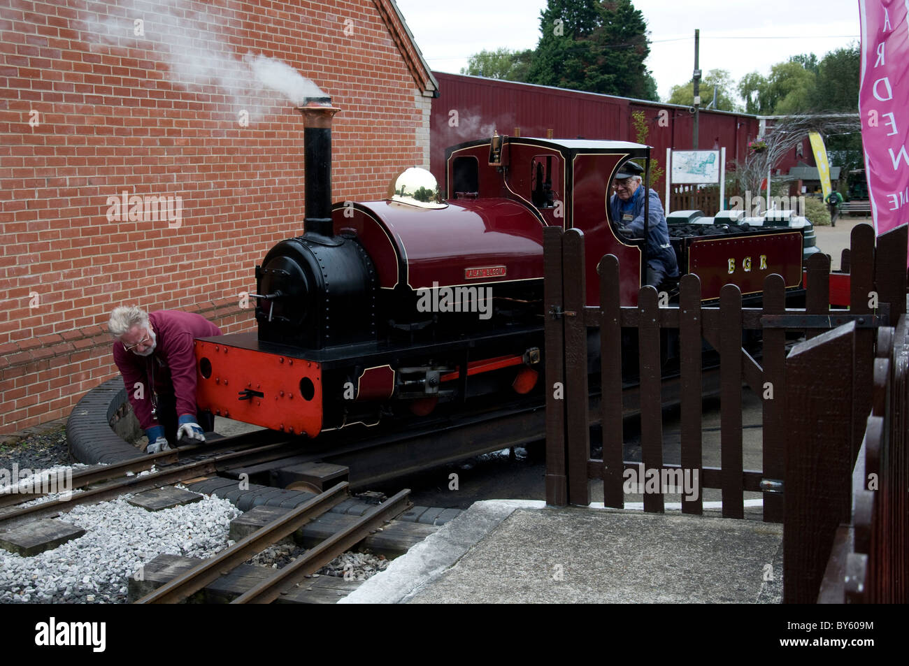 Small steam locomotive on a turntable at Bressingham Steam Museum in ...